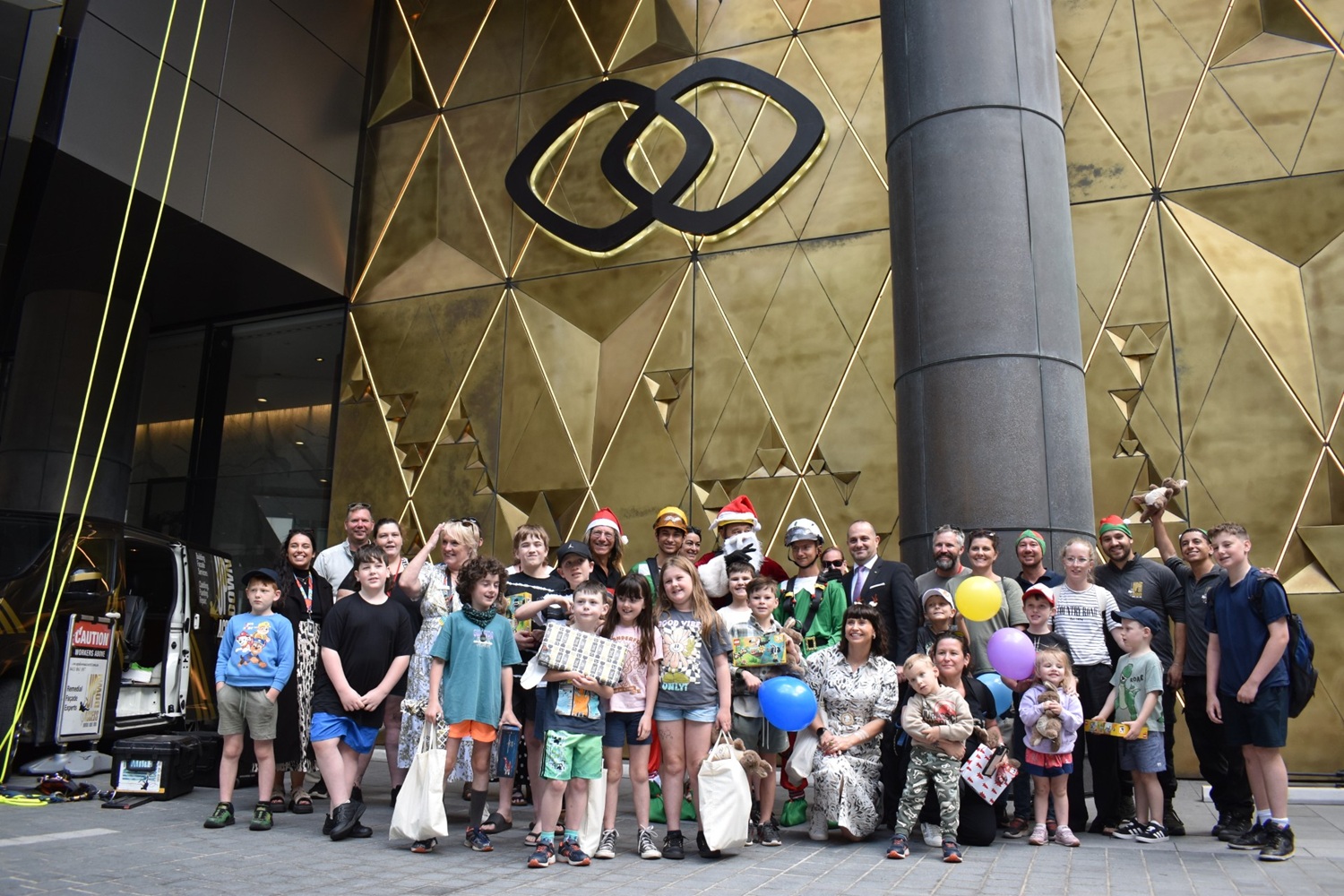 Santa abseils into Christmas cheer for Royal Far West kids at Sofitel ...